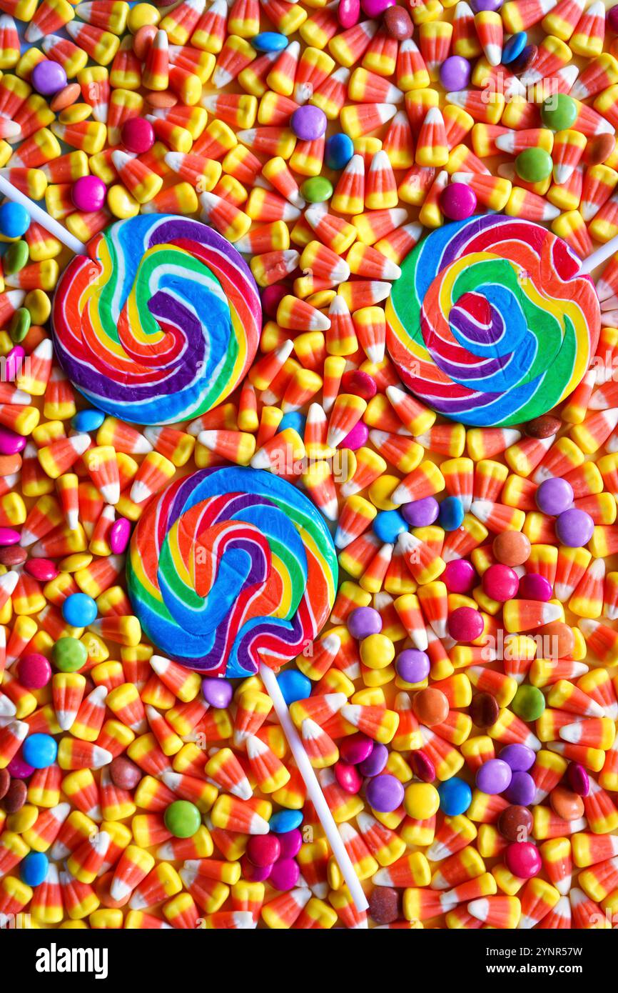 Lollipops and candy with modern color blocking aesthetic Stock Photo ...