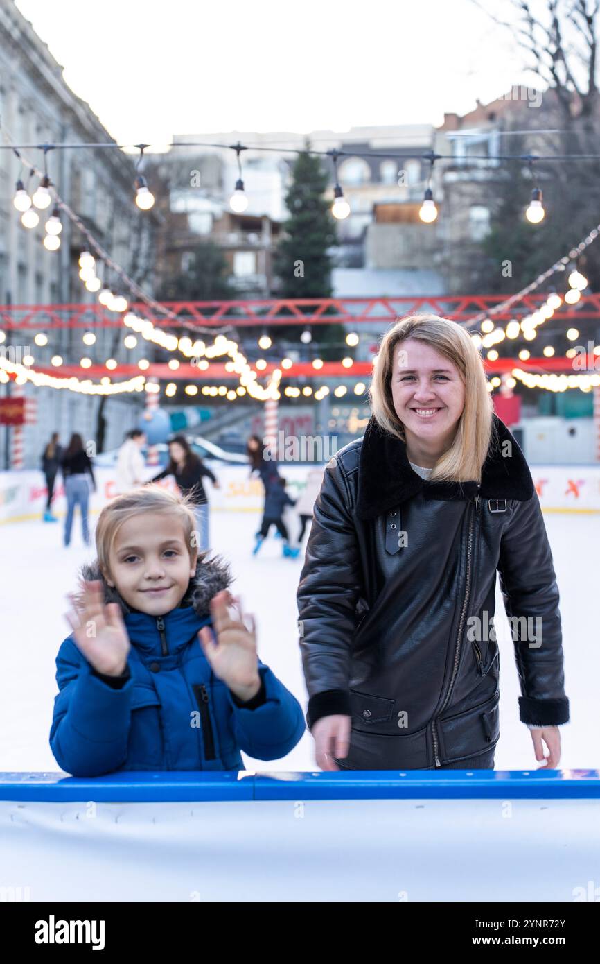 ice rink, skating, mother and child, winter fun, ice skating, festive ...