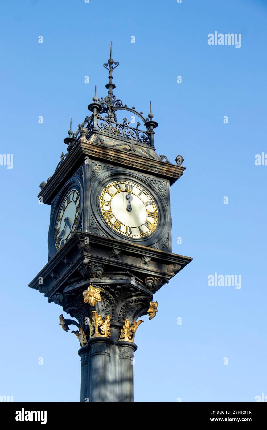 Historic ornate clock on a decorative pillar showcasing intricate ...