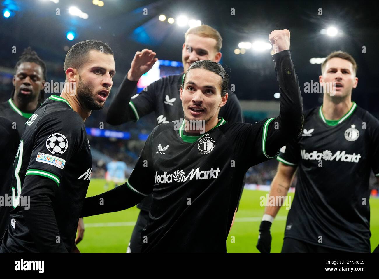 Feyenoord's David Hancko (left) celebrates scoring their side's third ...