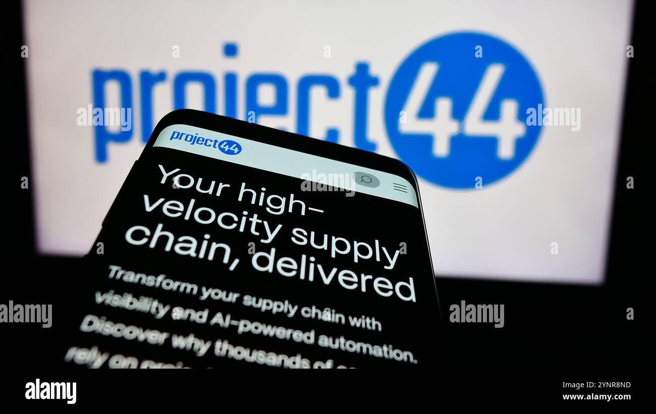 In this photo illustration, a mobile phone with the website of US supply chain software company ...