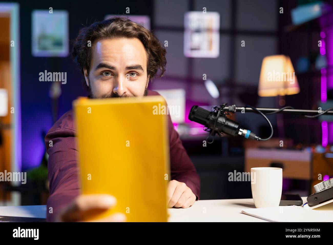 Social media creator raising camera hi-res stock photography and images ...