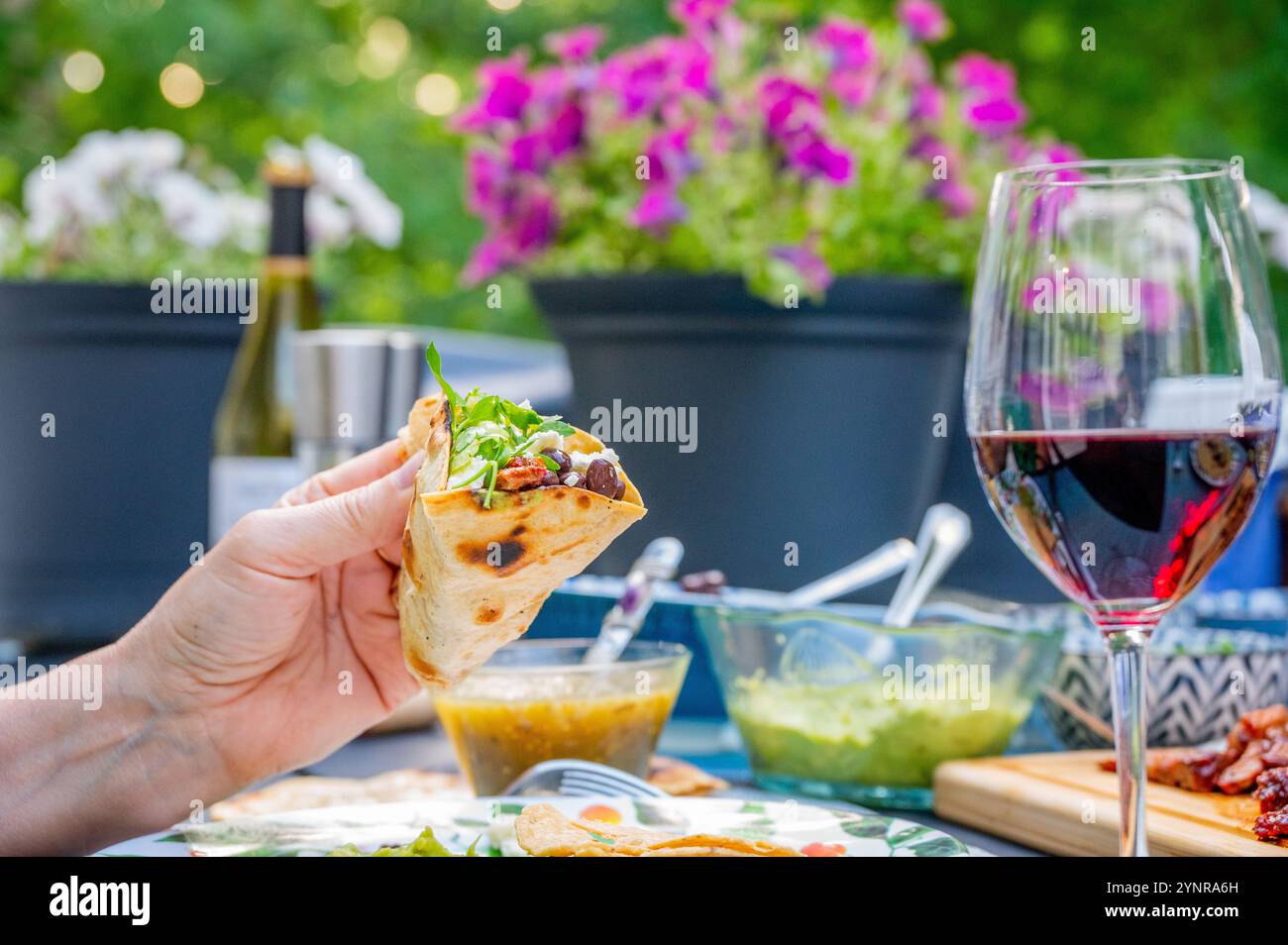 Taco and wine enjoyed outdoors in Spring Stock Photo - Alamy