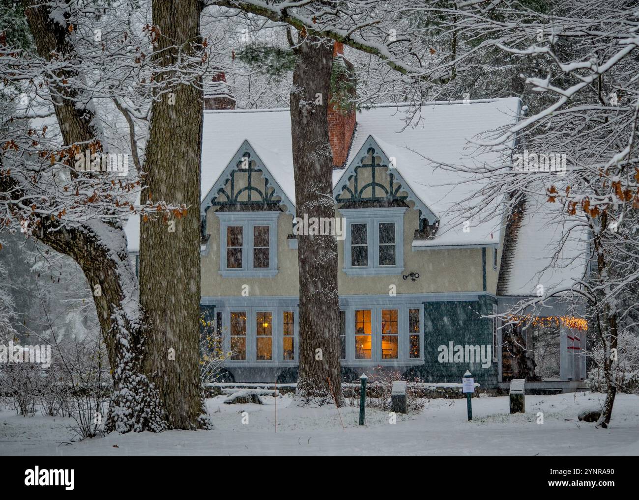 Victorian house in snow with Christmas lights Stock Photo - Alamy