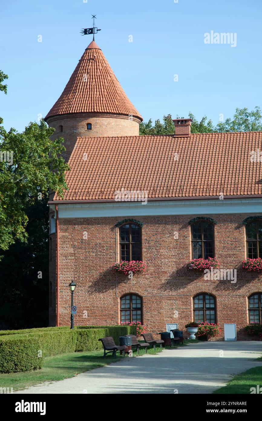 The view of historic 17th century Raudondvaris Castle tower in early ...