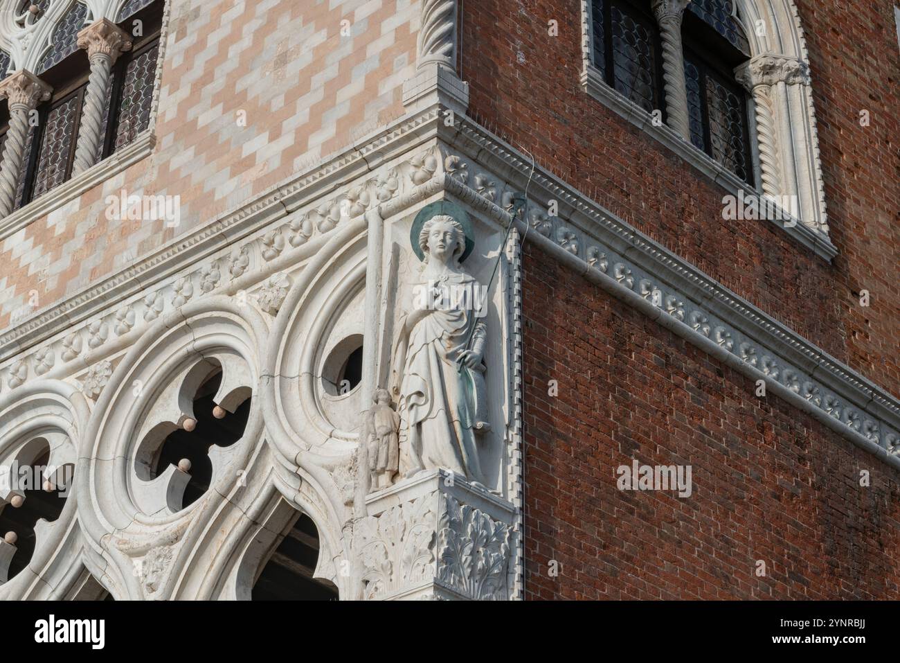 details of the sculpture of the archangel Raphael, on the facade of the ...