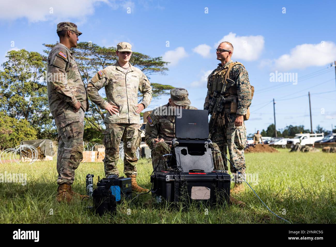 U.S. Marine Corps 1st Lt. Oscar Parmenter, right, a native of Texas and ...