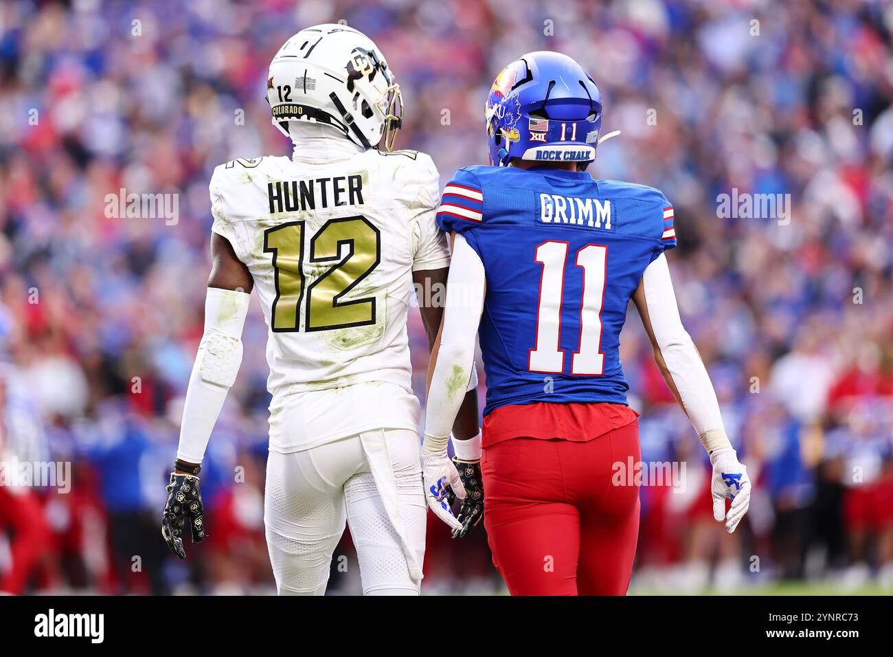 Colorado cornerback Travis Hunter (12) and Kansas wide receiver Luke ...