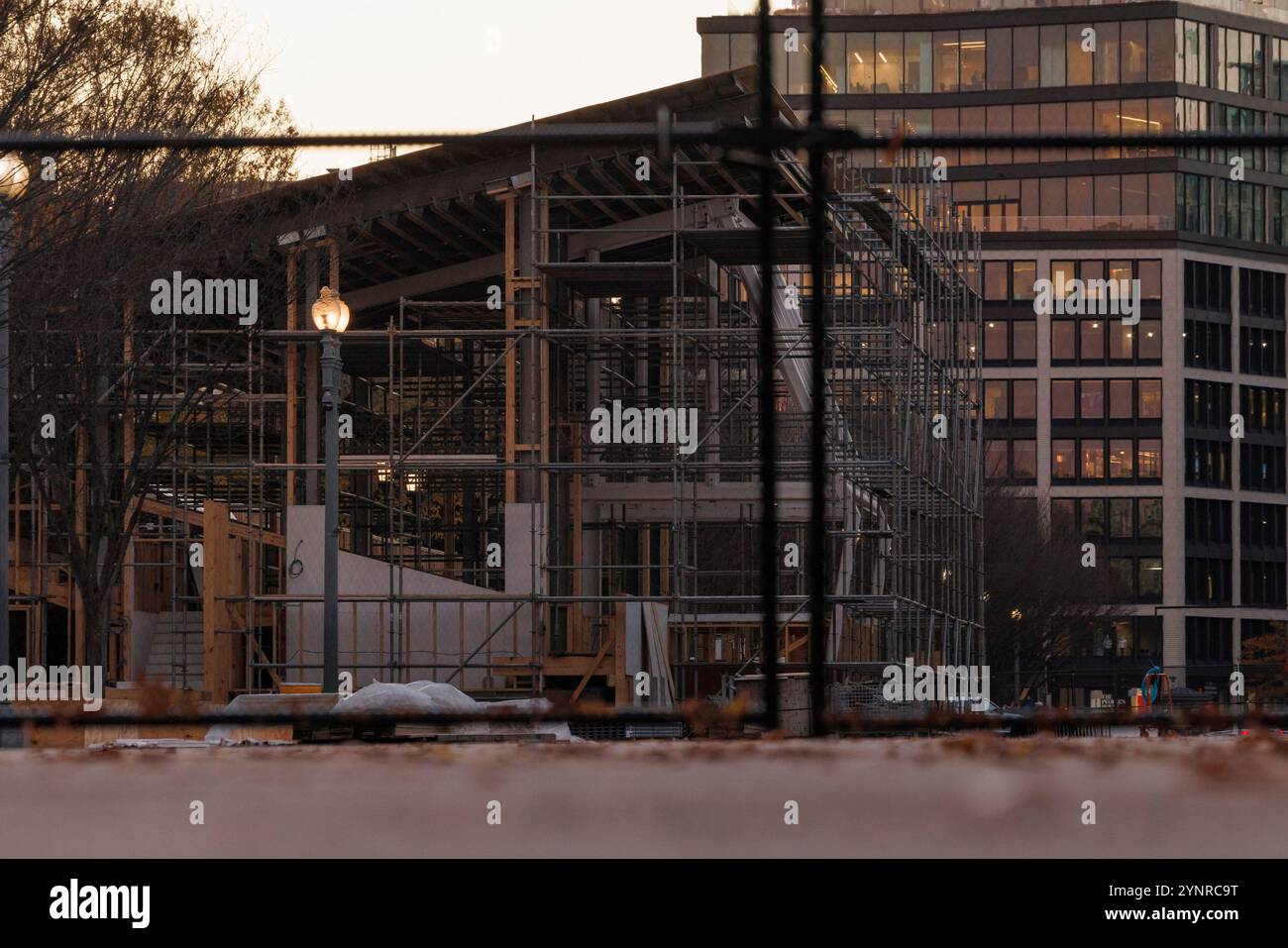 Crews work to construct the Inaugural Parade viewing platform in front ...
