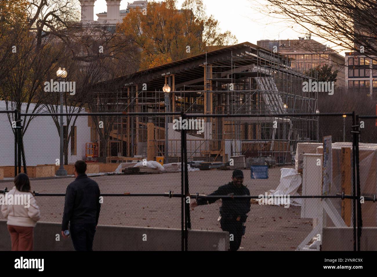 Crews work to construct the Inaugural Parade viewing platform in front ...