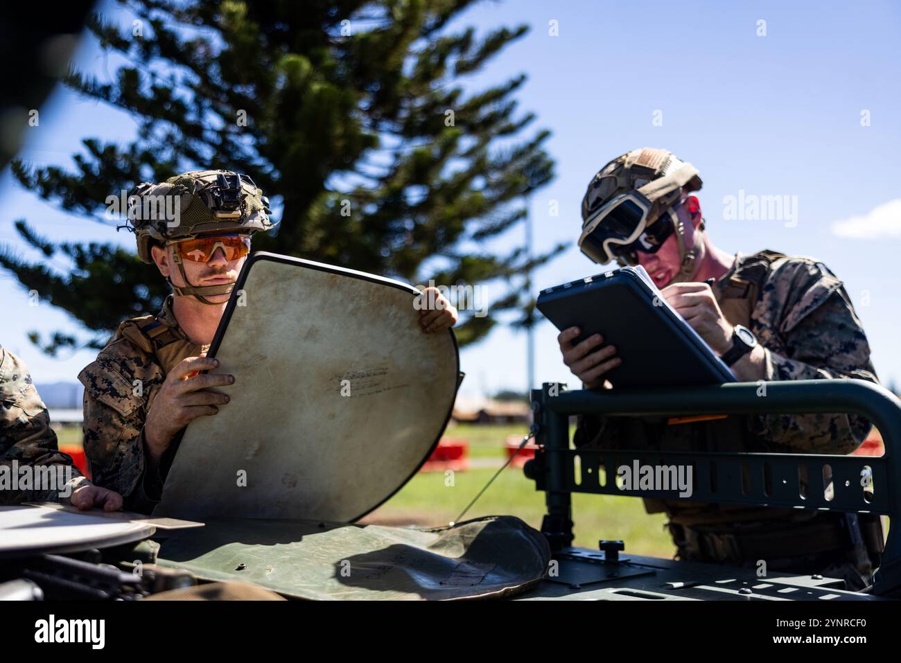 U.S. Marine Corps Lance Cpl. Tayler Ott, left, a native of Wisconsin ...