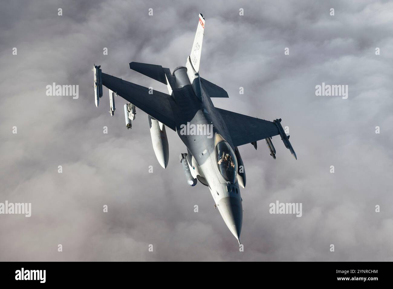A U.S. Air Force F-16 Fighting Falcon flies over the U.S. Central ...