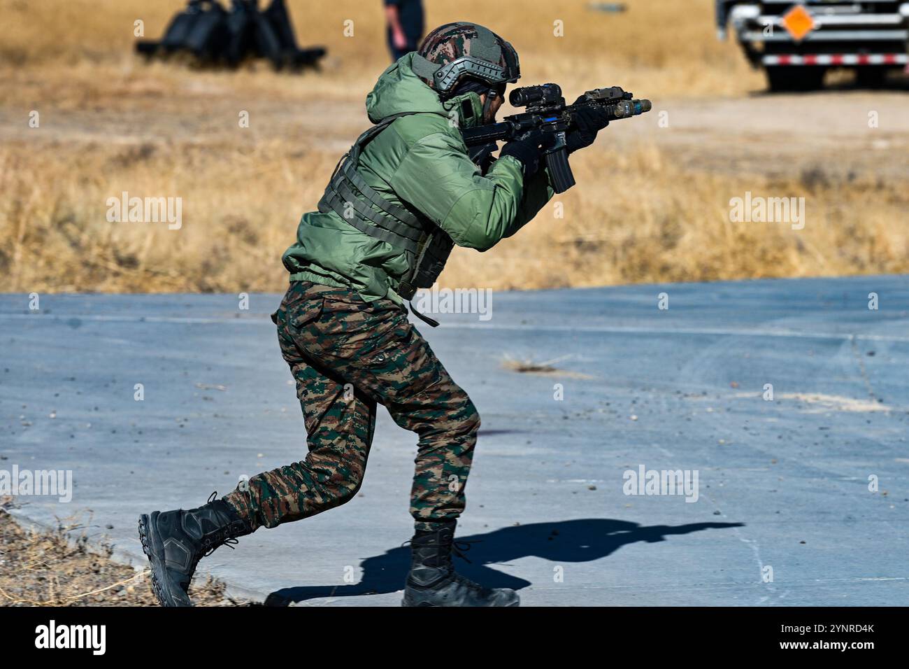 A soldier with India's Special Operations Forces moves toward an ...