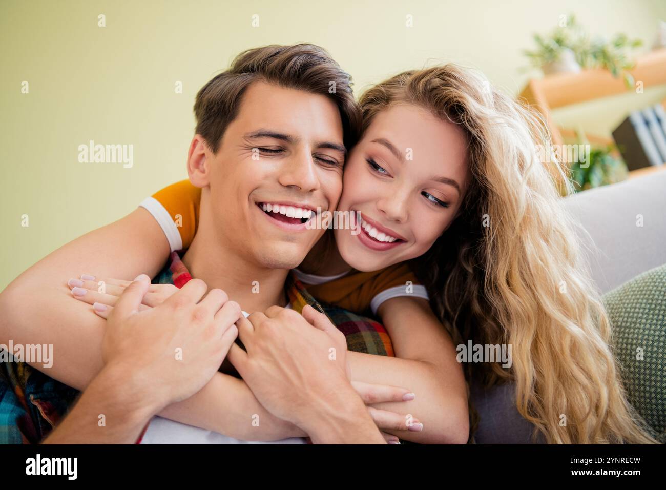 Photo of cute young couple cuddle care each other cozy day light spring ...