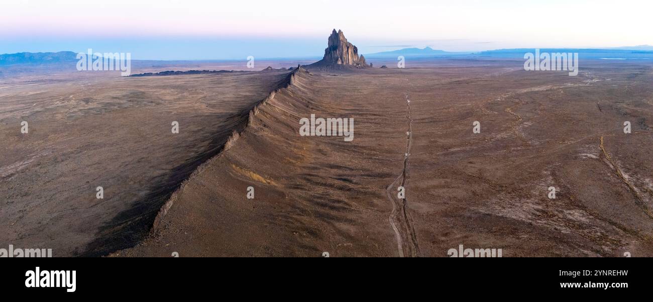 Sunrise aerial panoramic photograph of Shiprock, a monadnock near the town of Shiprock, New ...