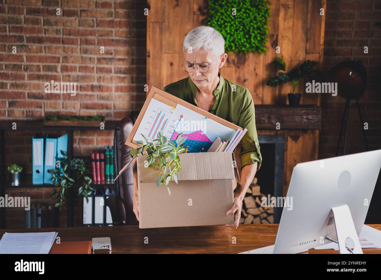Photo of charming retired lady dressed shirt move new office workplace ...