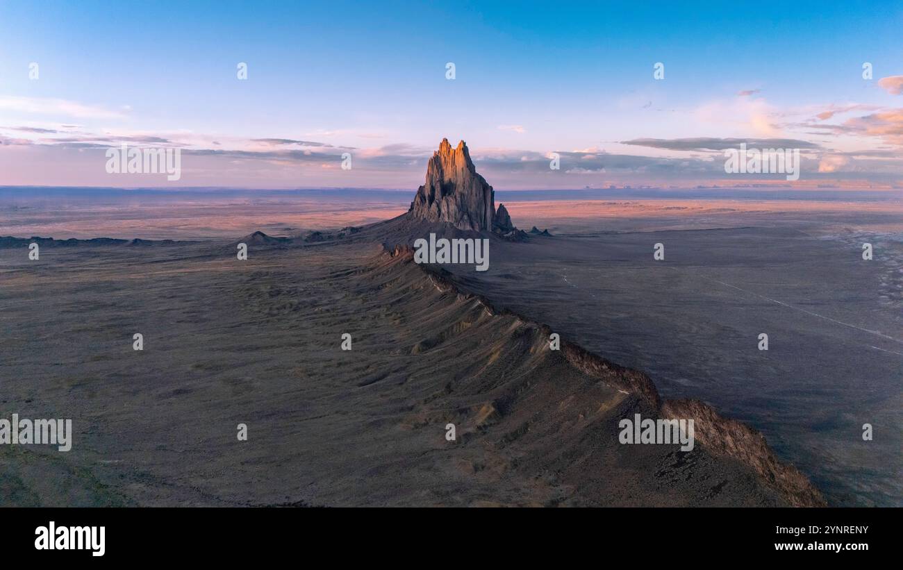 Sunset aerial photograph of Shiprock, a monadnock near the town of Shiprock, New Mexico, USA ...