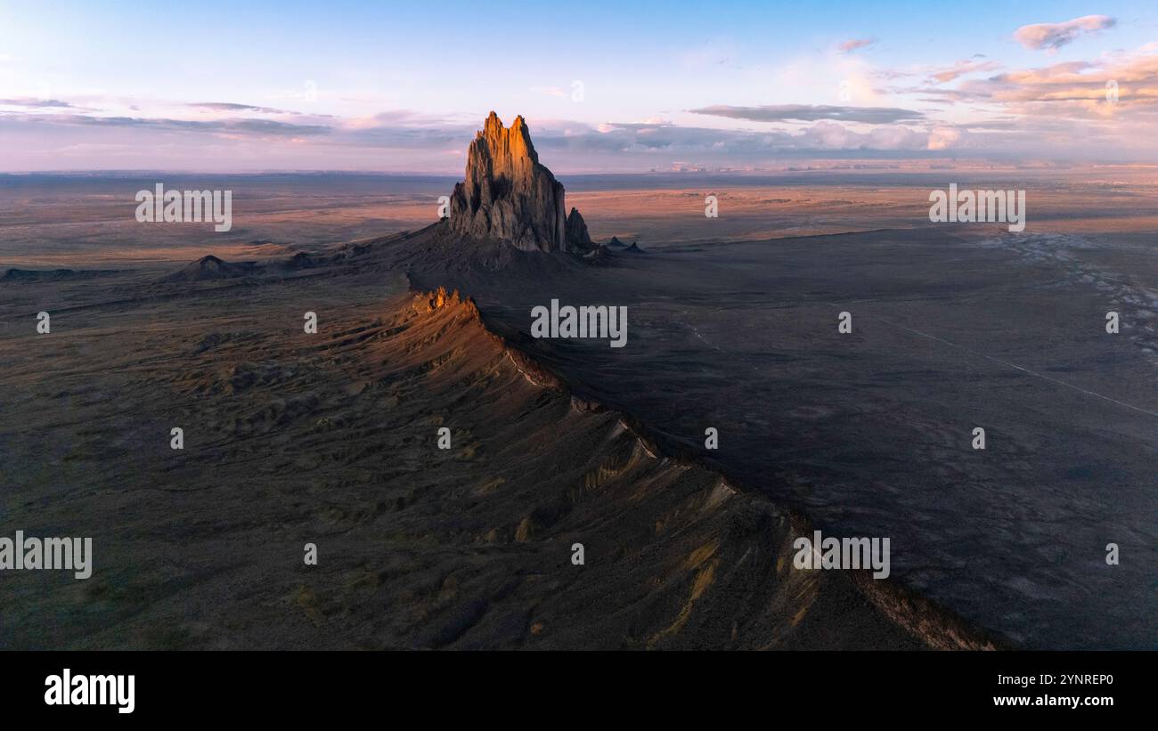 Sunset aerial photograph of Shiprock, a monadnock near the town of Shiprock, New Mexico, USA ...