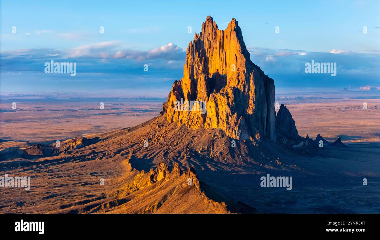Sunset aerial photograph of Shiprock, a monadnock near the town of Shiprock, New Mexico, USA ...