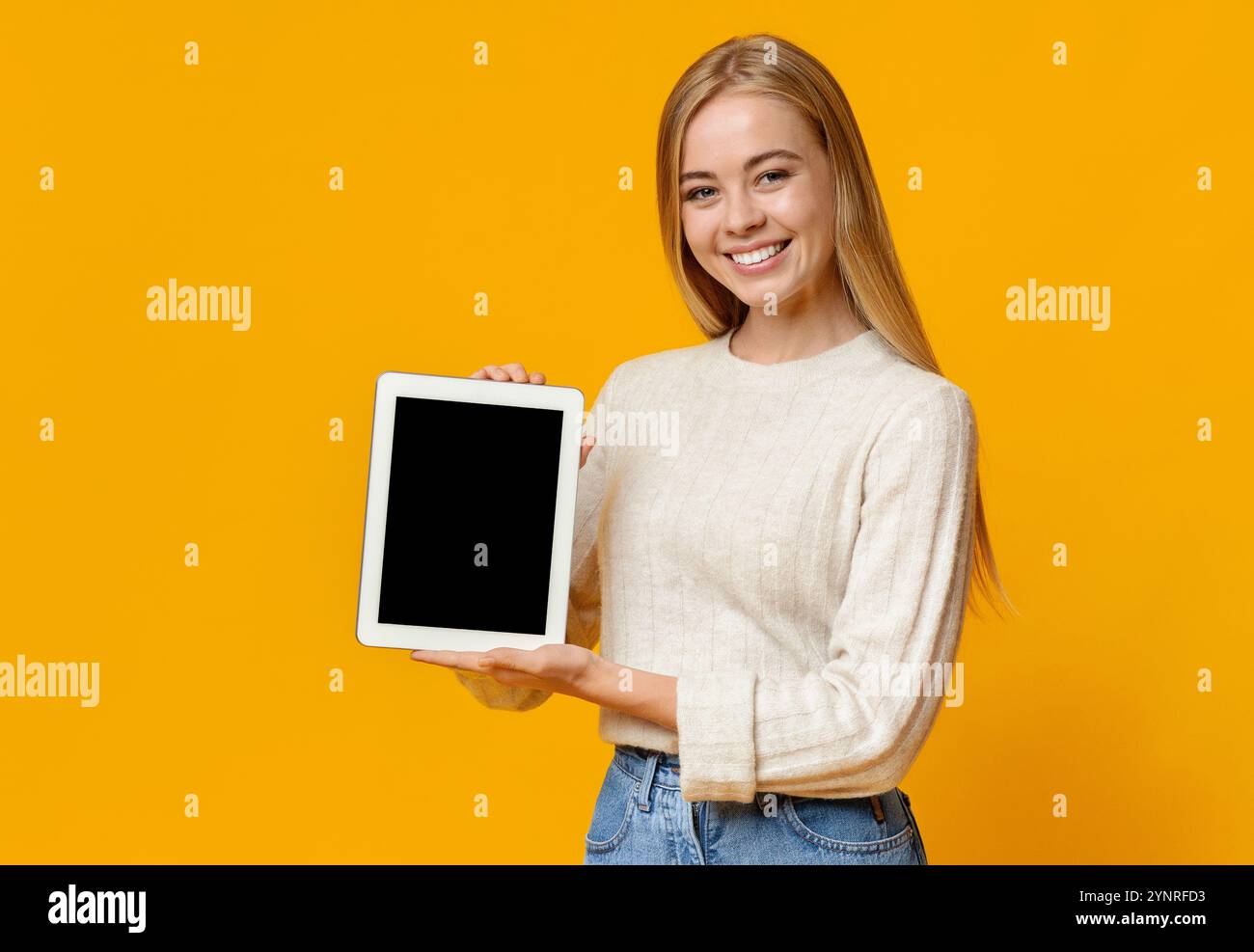 Beautiful teen girl holding digital tablet with blank screen Stock ...