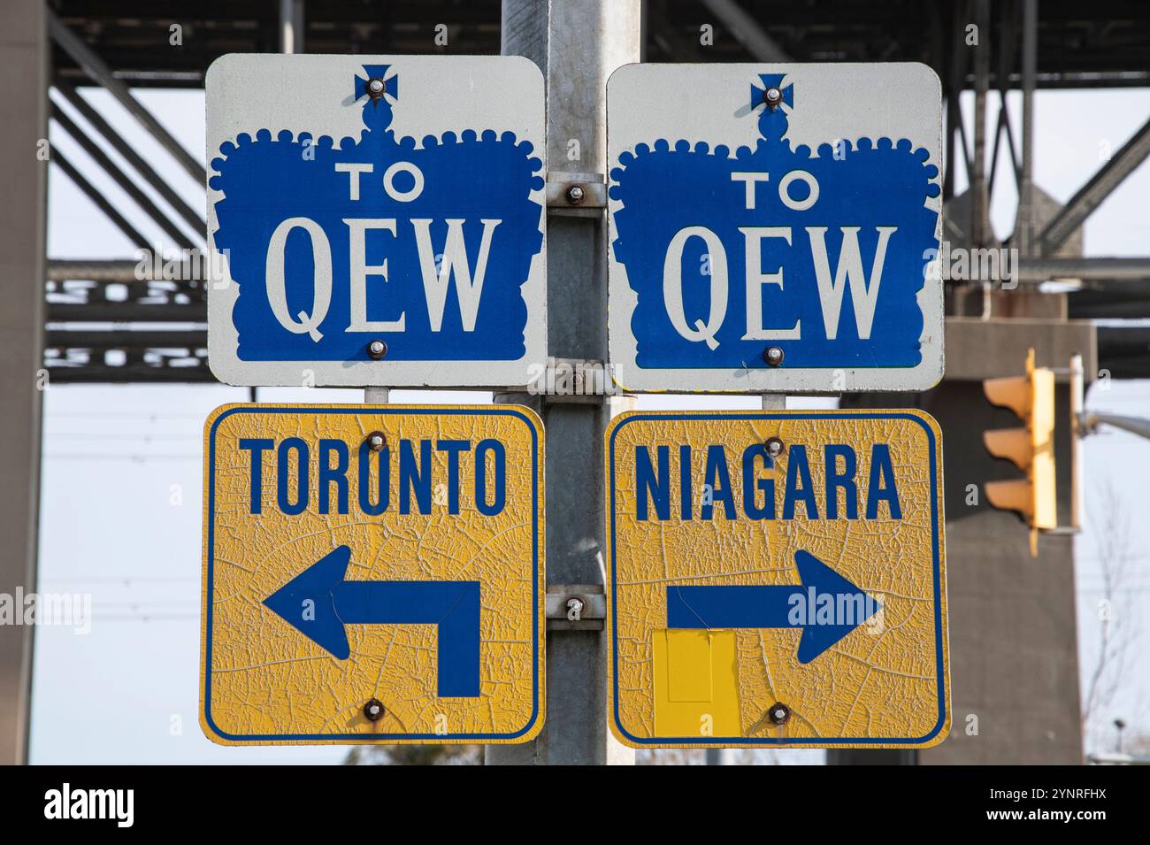 Directional QEW signs to Toronto and Niagara on Lakeshore Road in ...