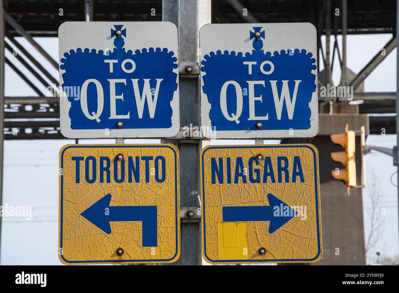 Directional QEW signs to Toronto and Niagara on Lakeshore Road in ...