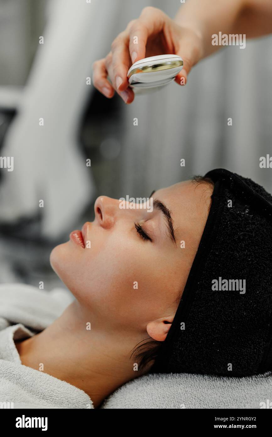Relaxing facial treatment at a spa with a soothing massage Stock Photo ...