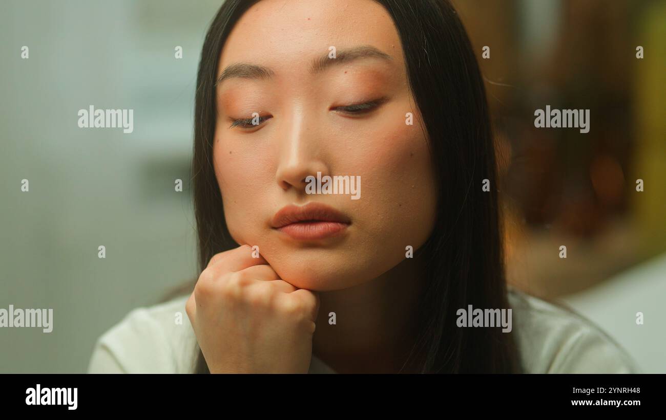 Sad lonely frustrated upset Asian Korean woman girl student ...