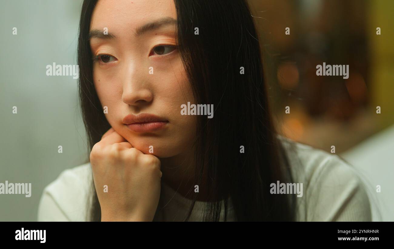 Alone sad upset Asian korean chinese woman negative sadness mood ...