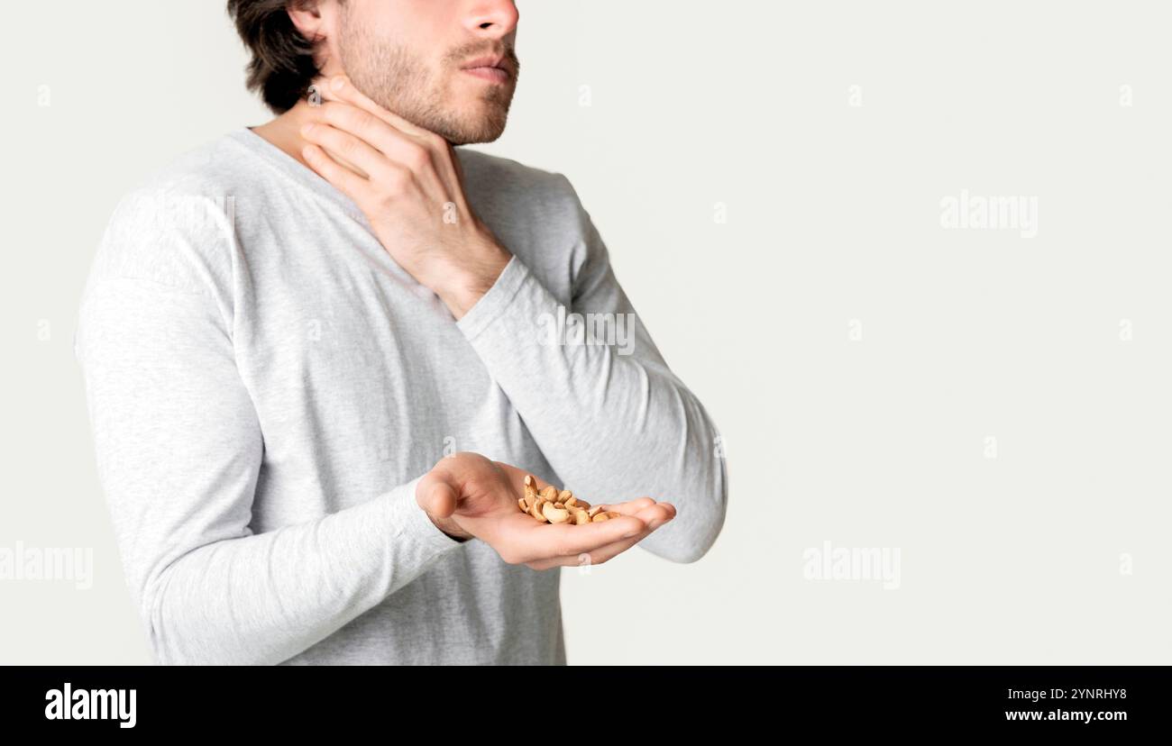 Allergic reaction to nuts, man suffocates, free space Stock Photo - Alamy