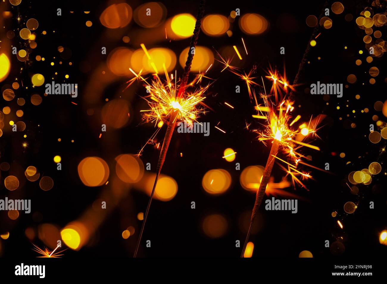 Sparkler Fireworks with Bokeh Effect. Christmas wallpaper. Sparkling ...