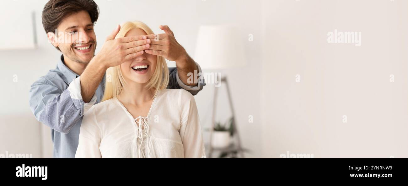 Husband Covering Woman Eyes Before Showing Their New Place Indoor Stock ...