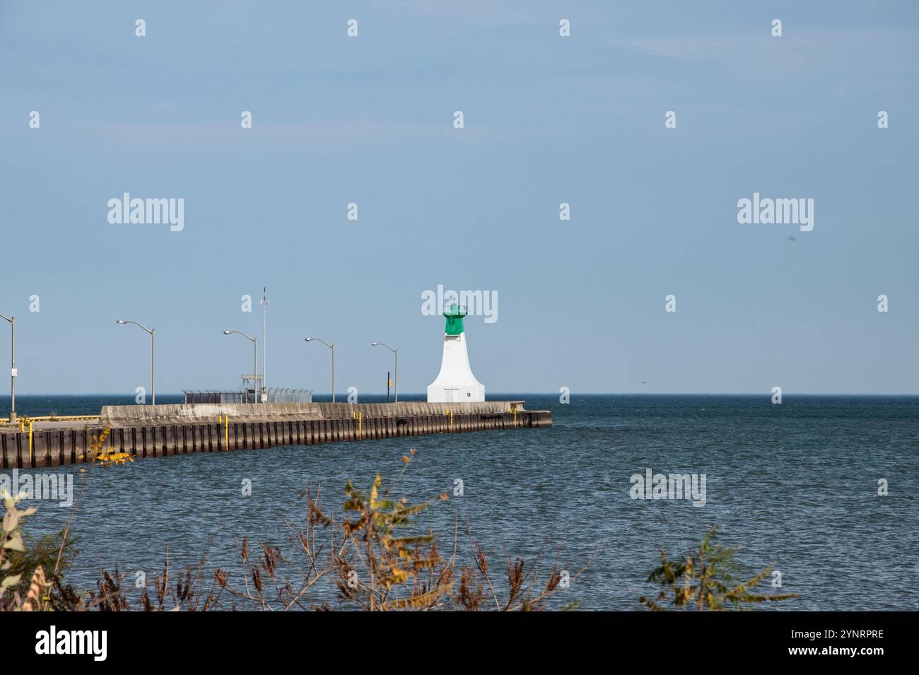 Breezeway Lighthouse on a pier at Hamilton Beach Park in Hamilton ...
