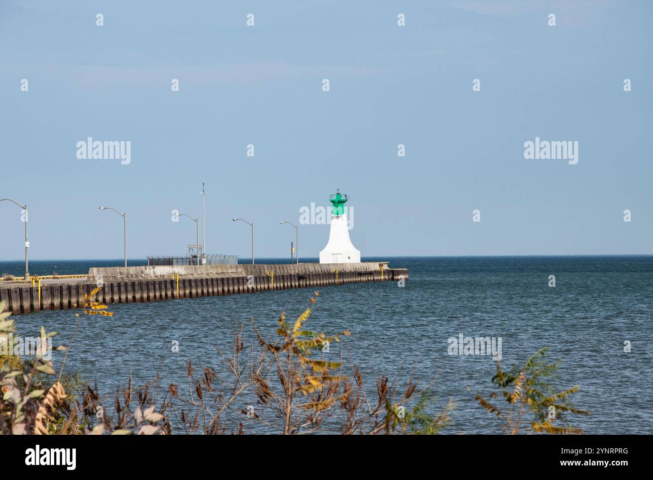 Breezeway Lighthouse on a pier at Hamilton Beach Park in Hamilton ...