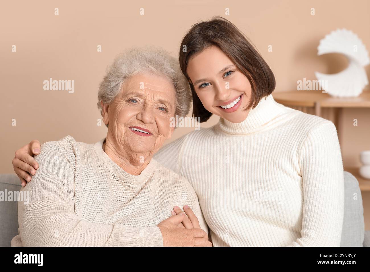 Old woman hugging young granddaughter hi-res stock photography and ...