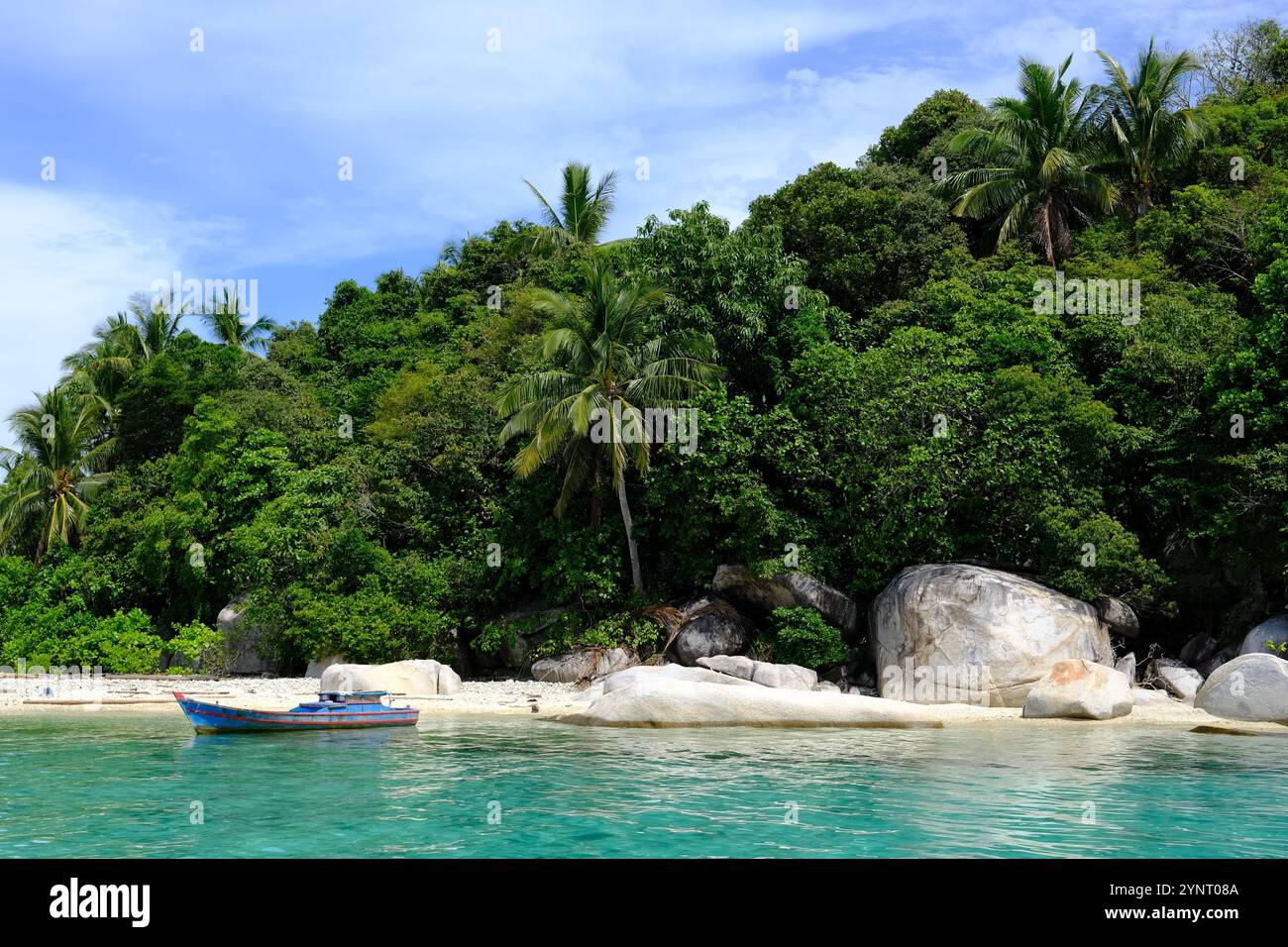 Indonesia Anambas Islands - Dinkor Island with fishing boat and large ...