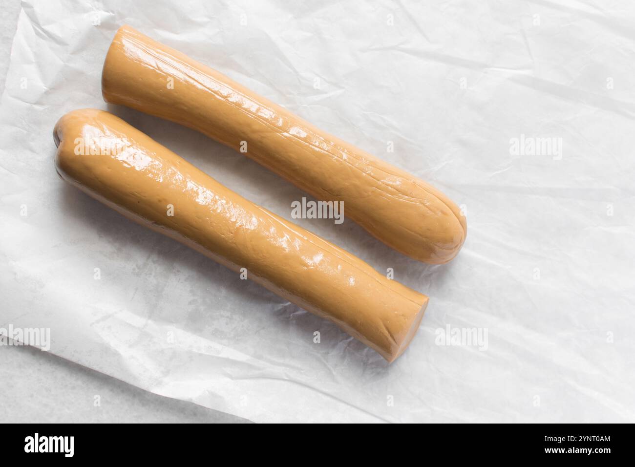 Overhead view of iloka candy on parchment paper, top view of cooked ...