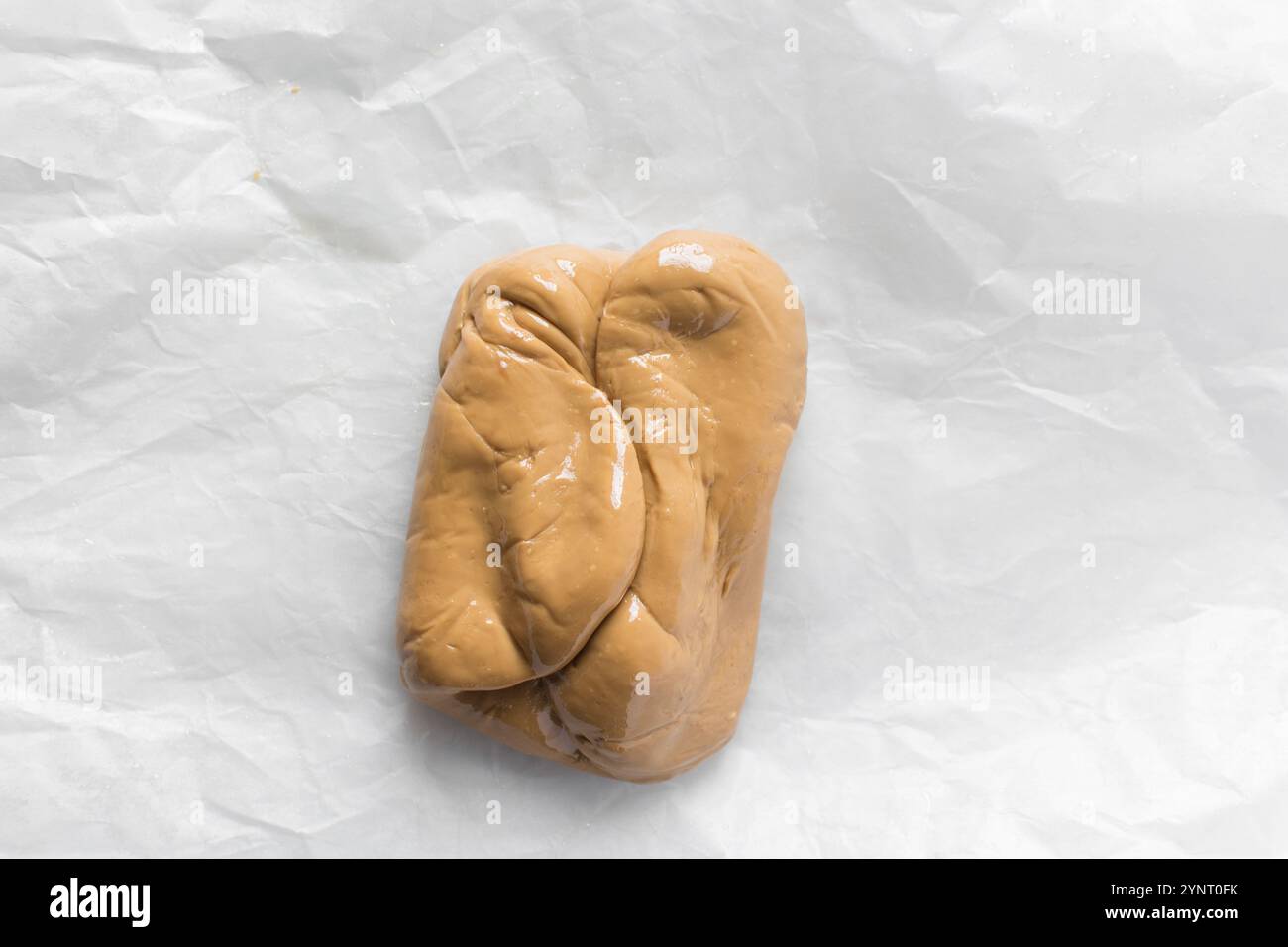 Overhead view of iloka candy on parchment paper, top view of cooked ...