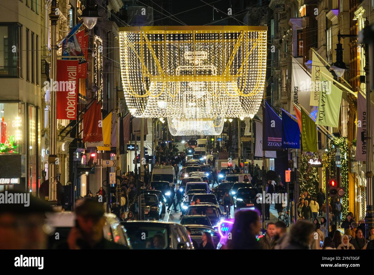 London, UK. Christmas decorations in the shape of the Chanel No.5 ...