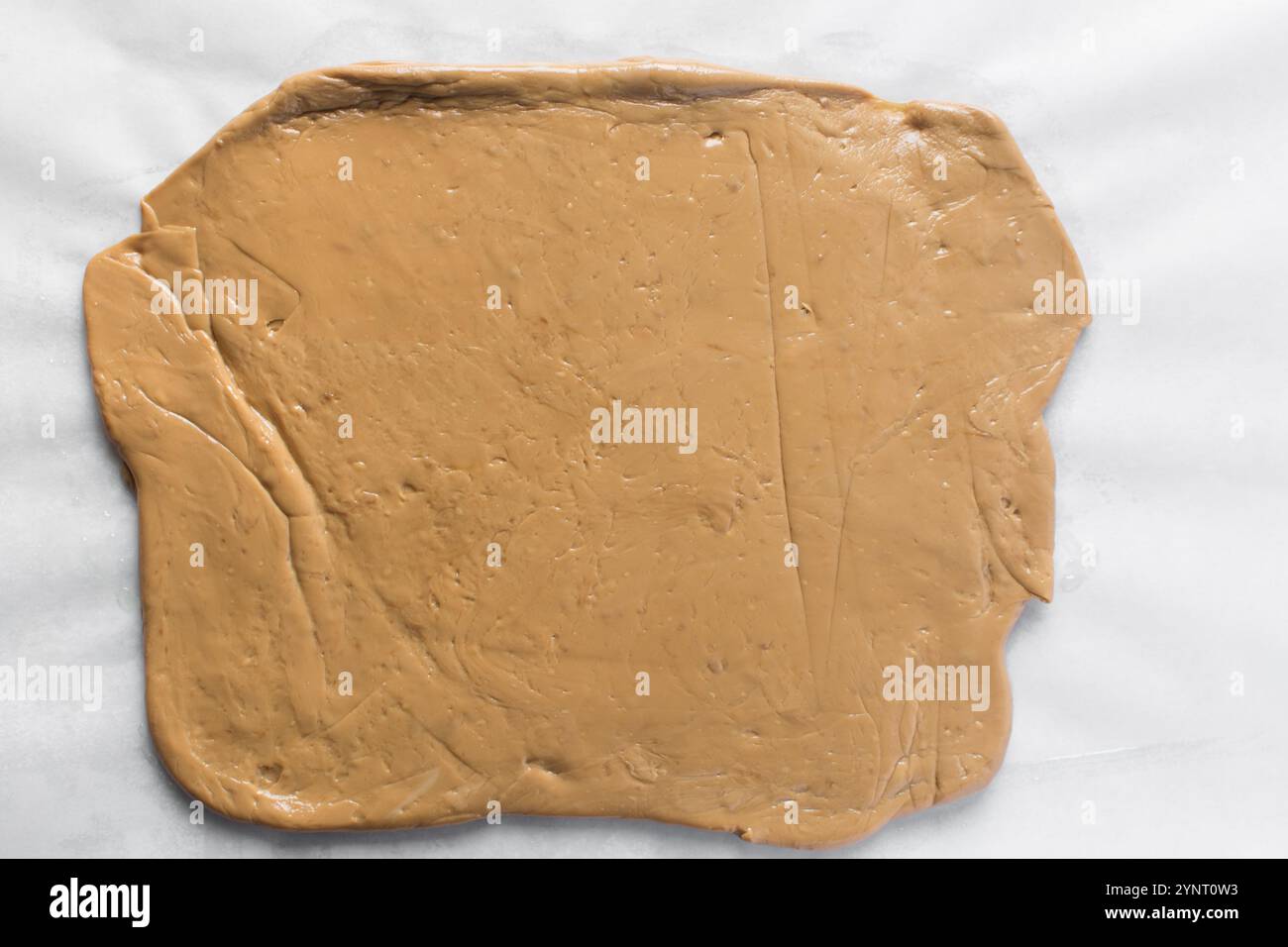 Overhead view of iloka candy on parchment paper, top view of cooked ...