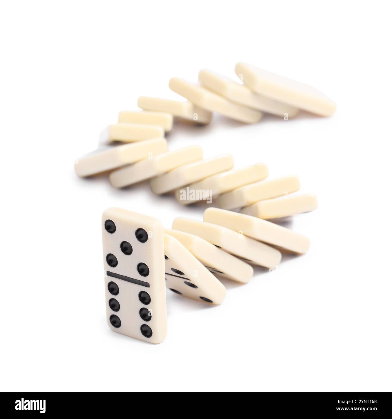 Domino effect. Tiles falling on white background Stock Photo - Alamy