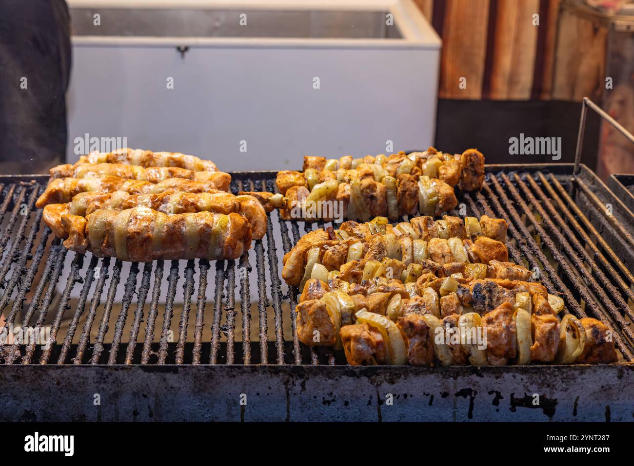 A few sticks of kebab in a grilled street stall Stock Photo - Alamy