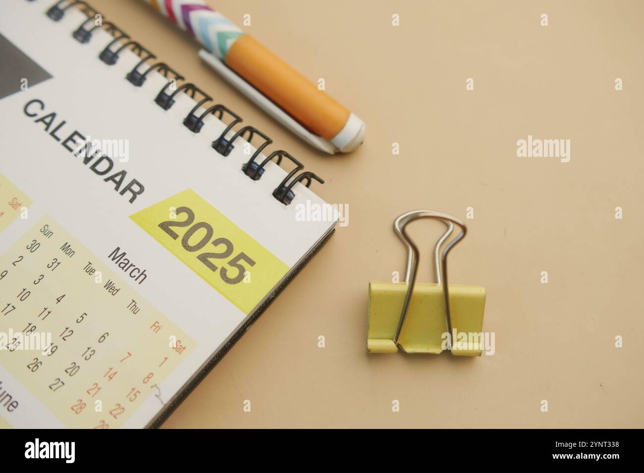 2025 year calendar on office desk Stock Photo - Alamy