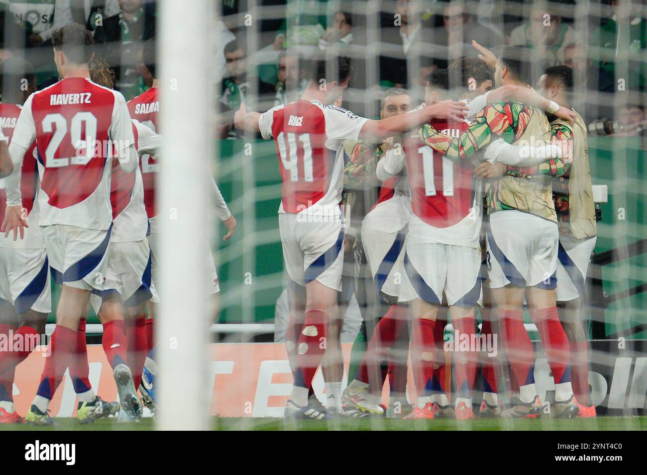 Lisbon, Portugal. 26th Nov, 2024. Arsenal FC players celebrate their ...