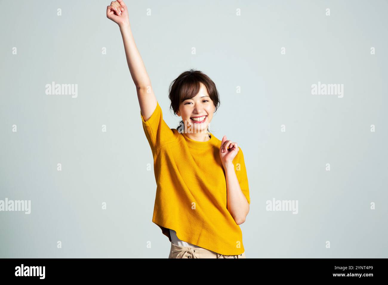 Raising an arm hi-res stock photography and images - Alamy