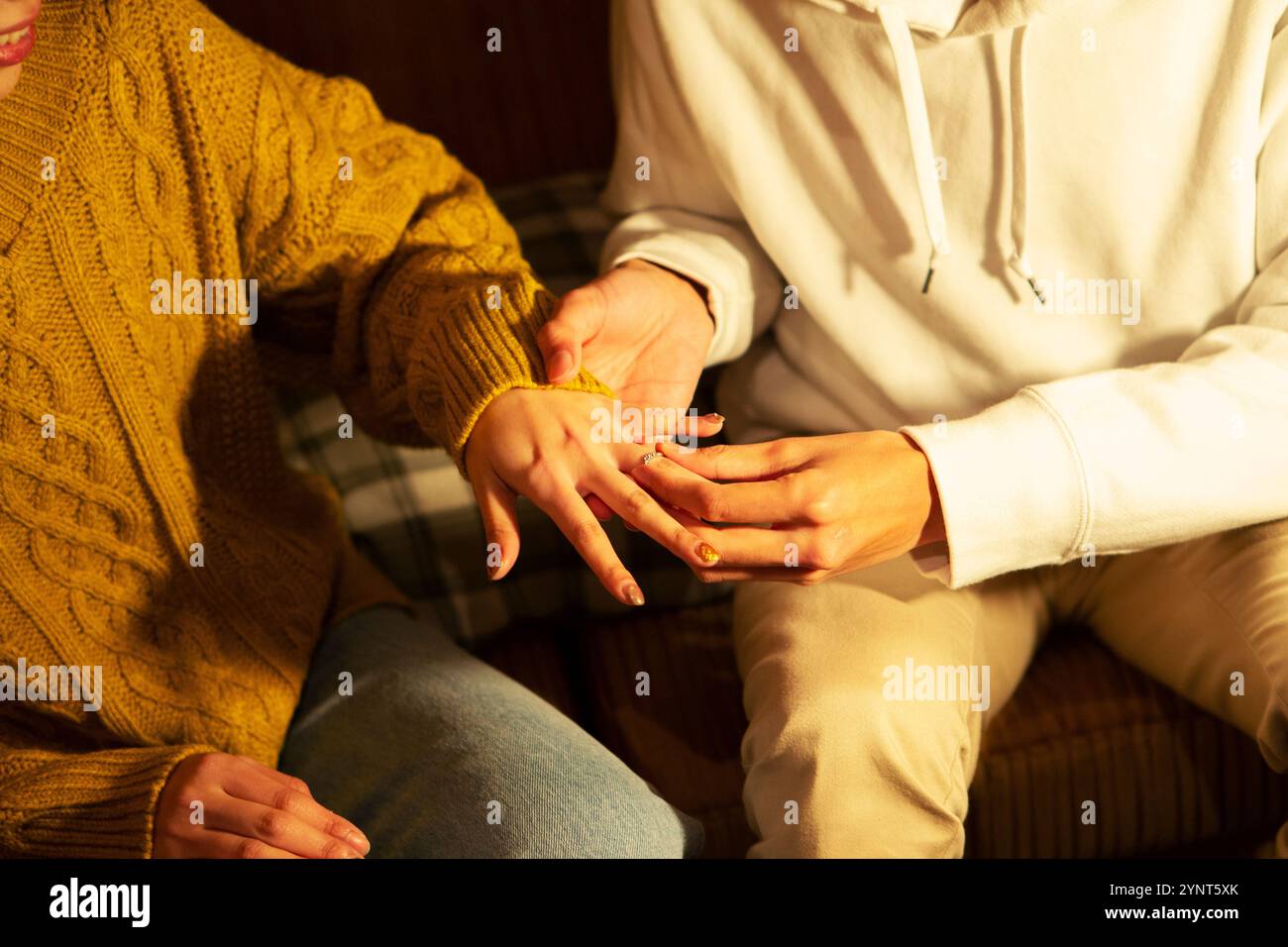 Hand placing gift hi-res stock photography and images - Alamy