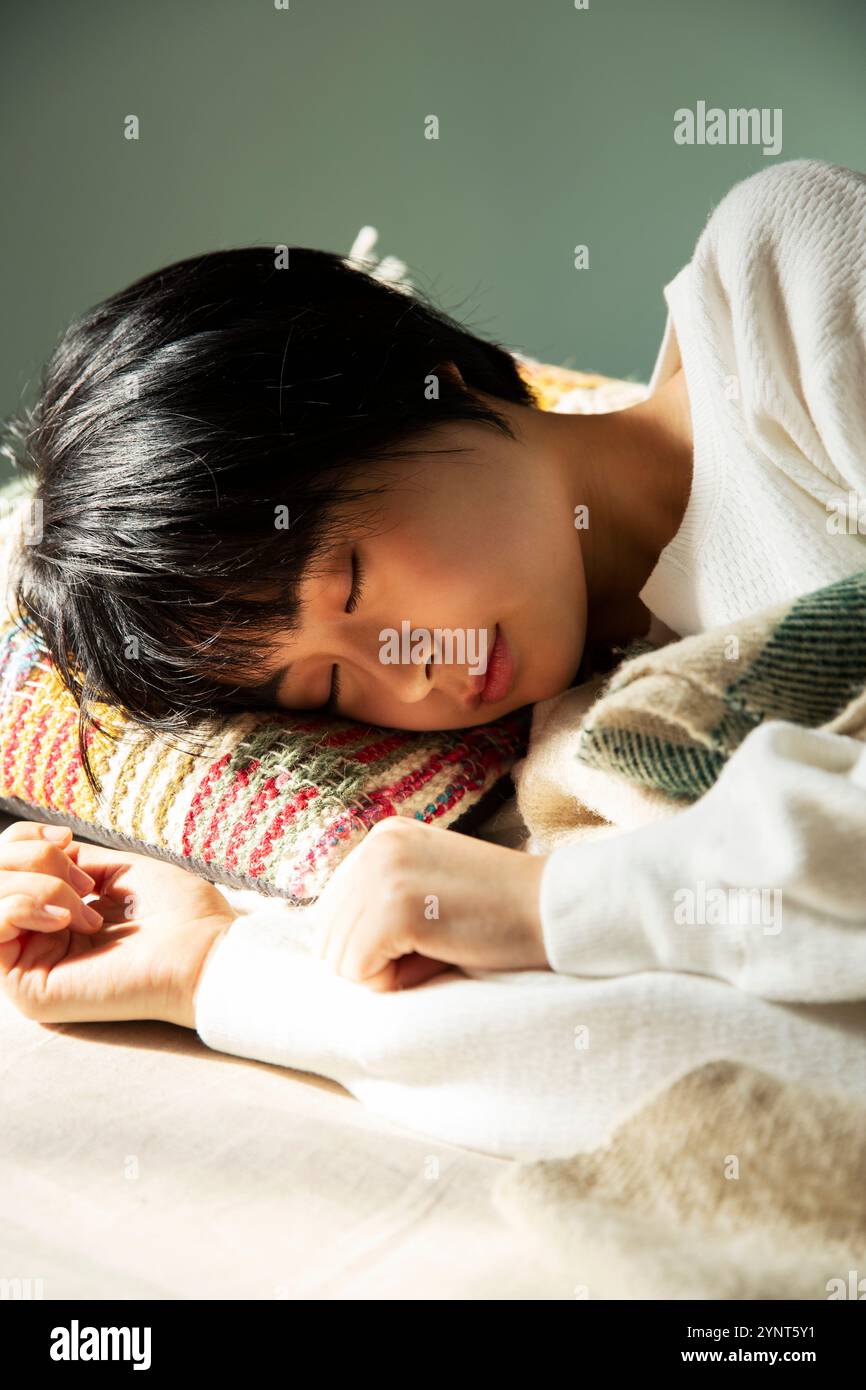 Woman taking nap hi-res stock photography and images - Alamy