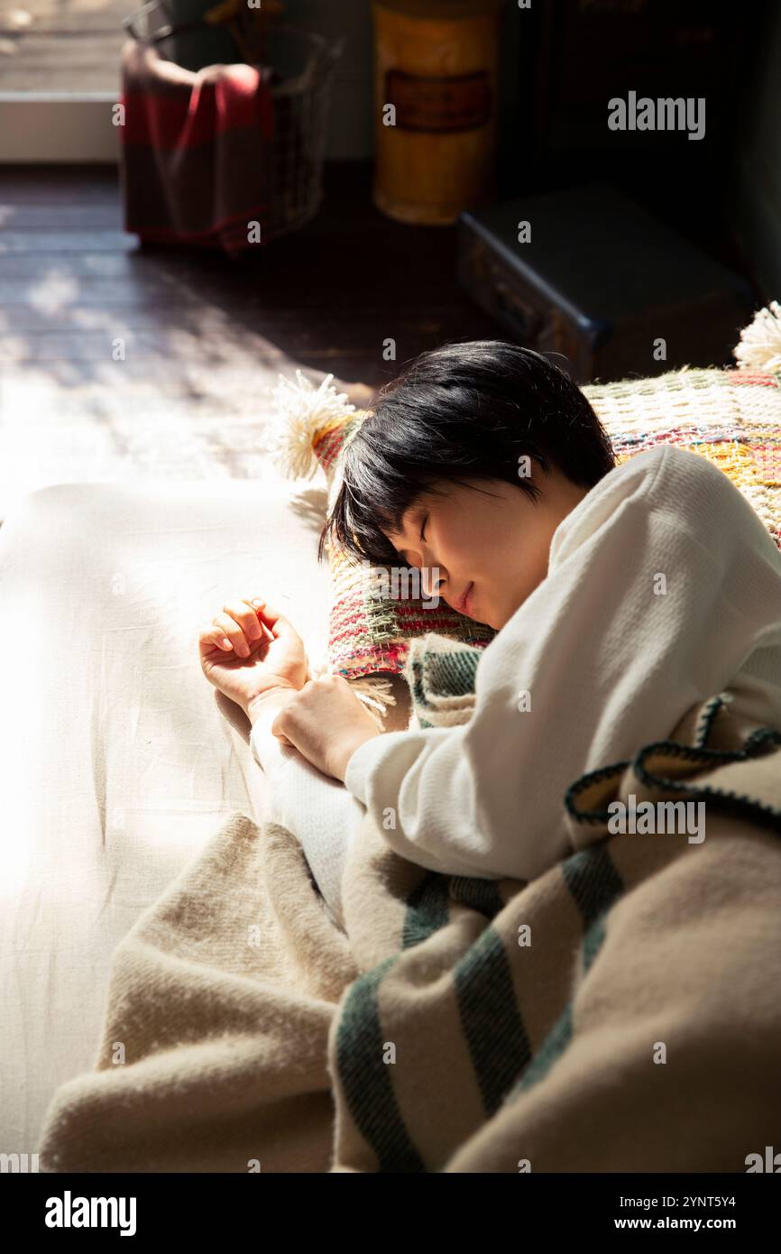 Woman taking nap hi-res stock photography and images - Alamy