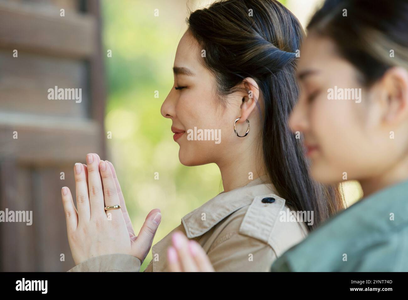 Two people praying together hi-res stock photography and images - Alamy