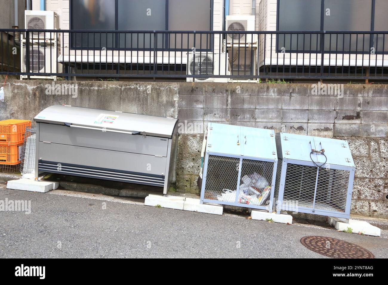 Rubbish storage area in an apartment block Stock Photo - Alamy